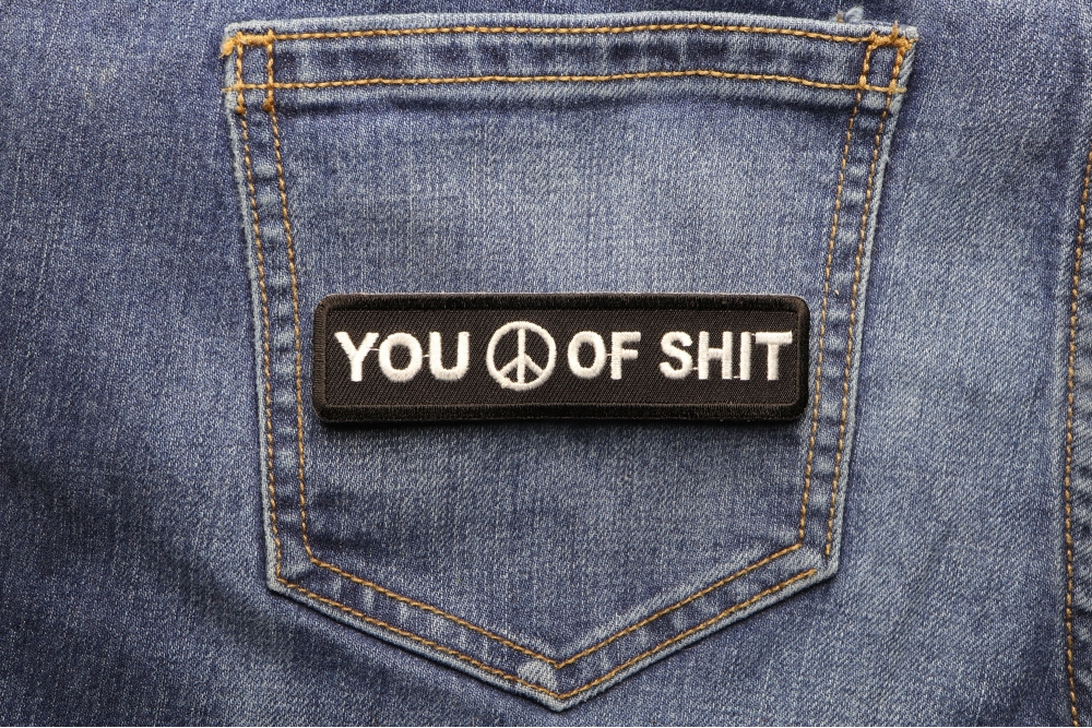 You Peace Of Shit Patch shown on jeans