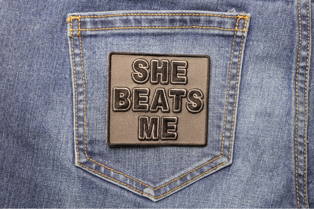She Beats Me Patch shown on jeans