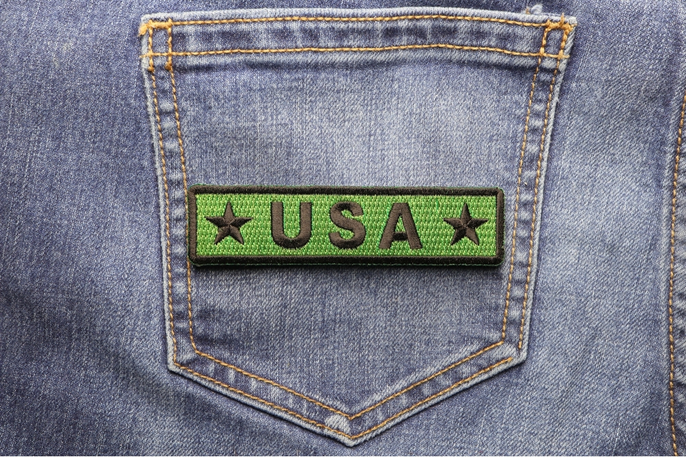 USA Black and Green Patch shown on jeans
