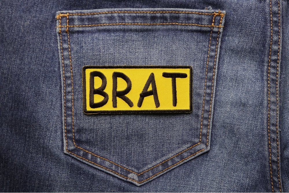Brat Patch shown on jeans